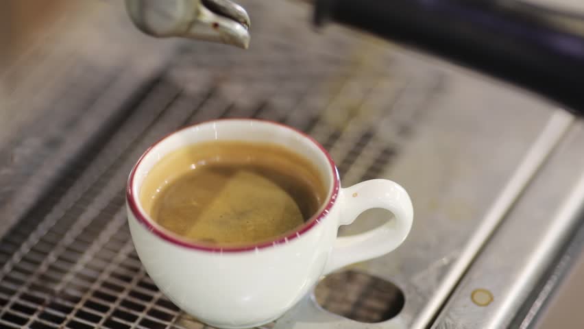 Stock Video Clip of Person takes ready-made coffee from a coffee ...