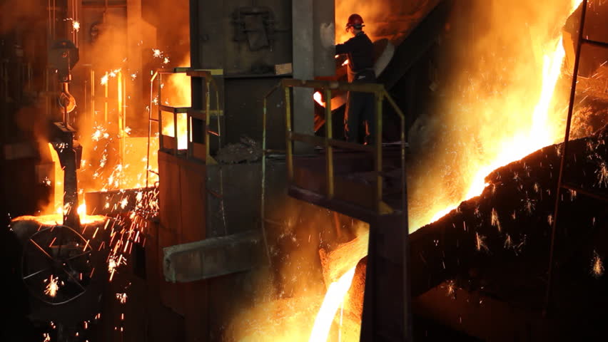 Hard Work In The Foundry, Liquid Metal In The Factory, Smelting Iron ...