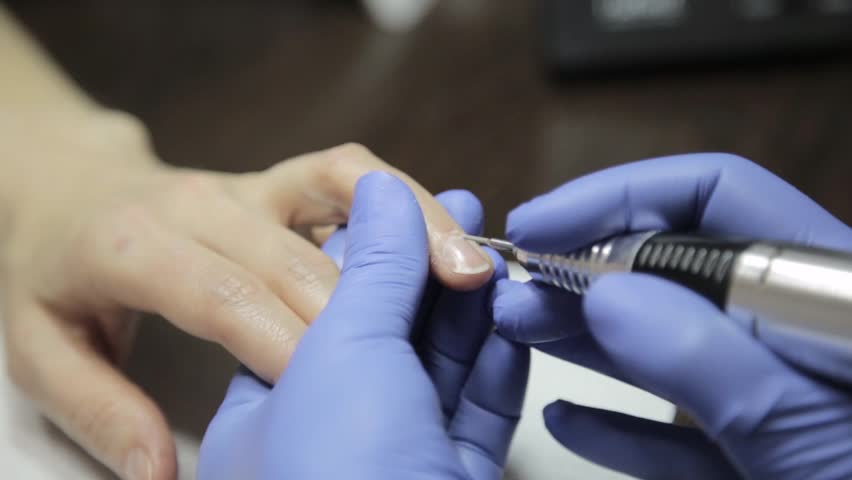 Nail Manicure - Pushing Back The Cuticles And Scrape Under The Nails To ...