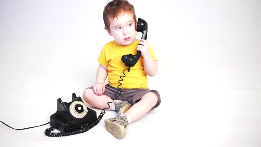 Pretty Happy Kid Calling On A Phone In Studio Varastovideo 3356855 ...