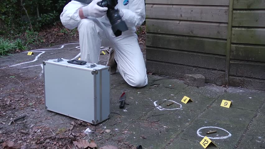 Stock Video Clip of Forensics police investigator taking photos of the ...