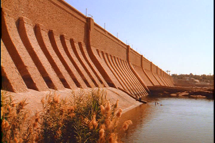 High Aswan Dam In Aswan, Egypt; Wide High Angle Shot Of Water Spilling ...