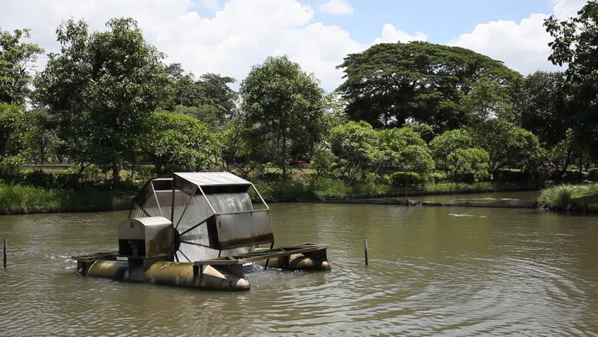 Stock video of metal wheel of watermill in pond | 4215535 | Shutterstock
