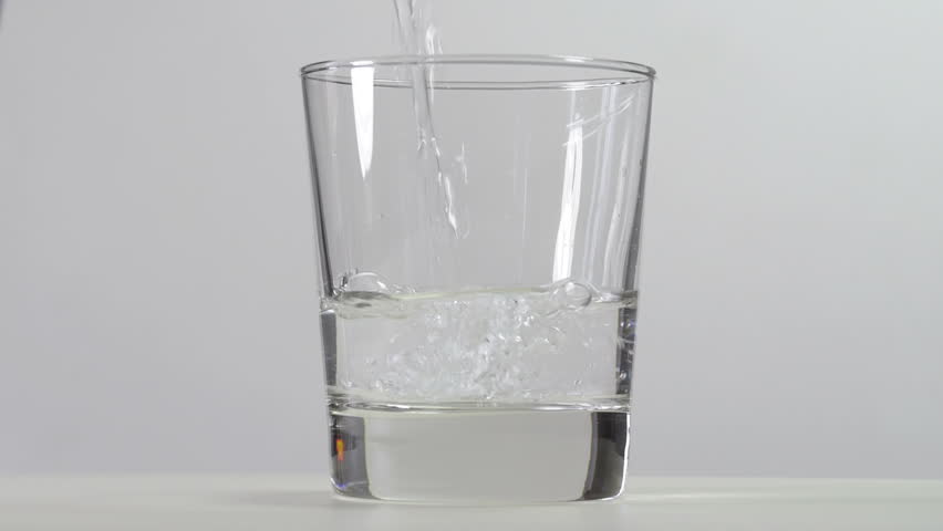 Water Pouring Into Invisible Glass Cup Then The Cup Starting To ...