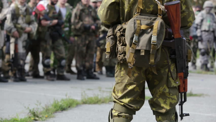 Stock Video Clip of Commando speaking about the plan of action ...