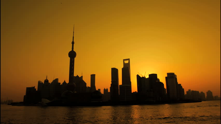 China - January 2012: Warm Tone View Of Sunrise Behind Modern Shanghai ...