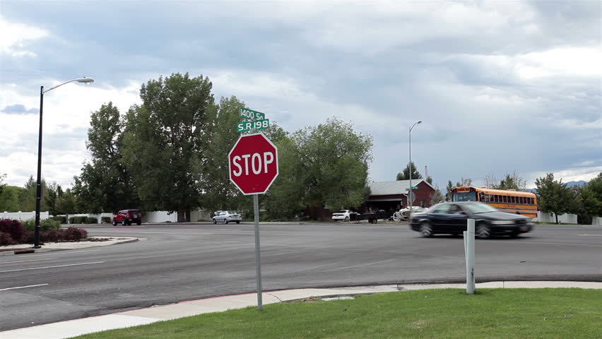Road Intersection Busy Traffic At Stop Sign Fast Timelapse. Busy Rural ...