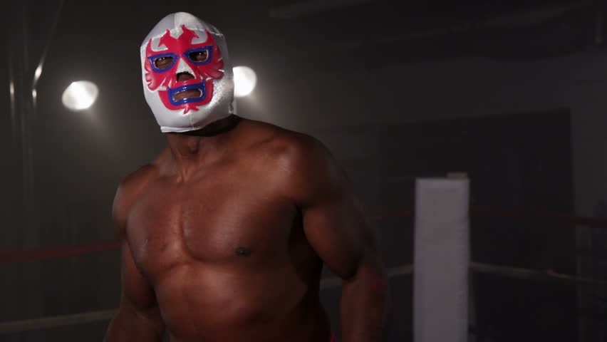 Masked Wrestler In Boxing Ring Flexing Muscles Stock Footage Video ...