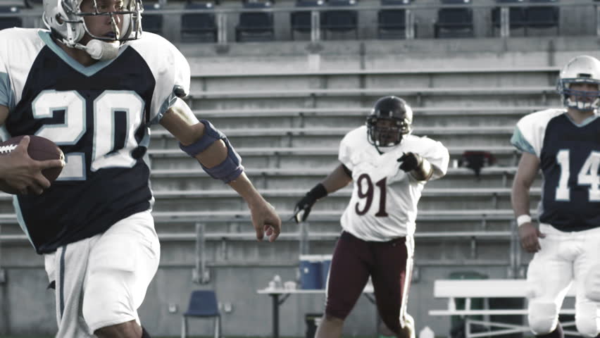 Quarterback Hikes the Ball and Stock Footage Video (100% Royalty-free ...