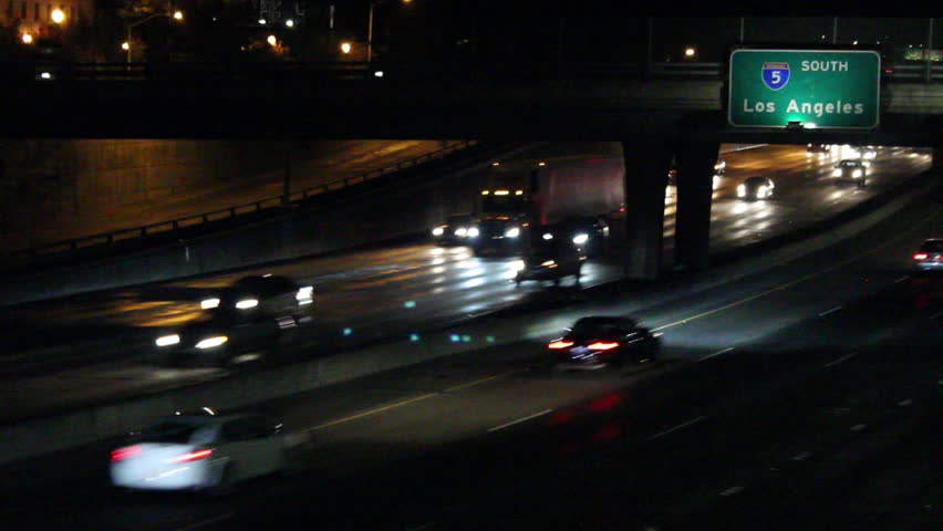 TRAFFIC TIME LAPSE RUSH HOUR AT NIGHT FREEWAY SIGNS LOS ANGELES SAN ...
