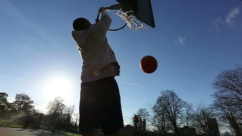 Stock video of basketball player slam dunking the ball | 5204255 ...