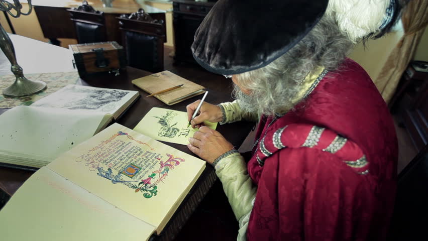 Stock Video Clip of Writer in medieval clothes writing in caligraphy ...