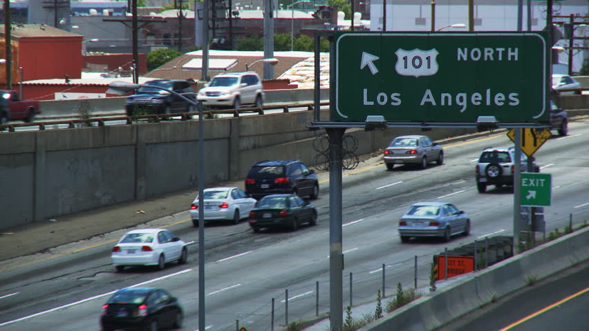 Los Angeles 101 Freeway Traffic. Vehicle Traffic Drives In And Out Of ...