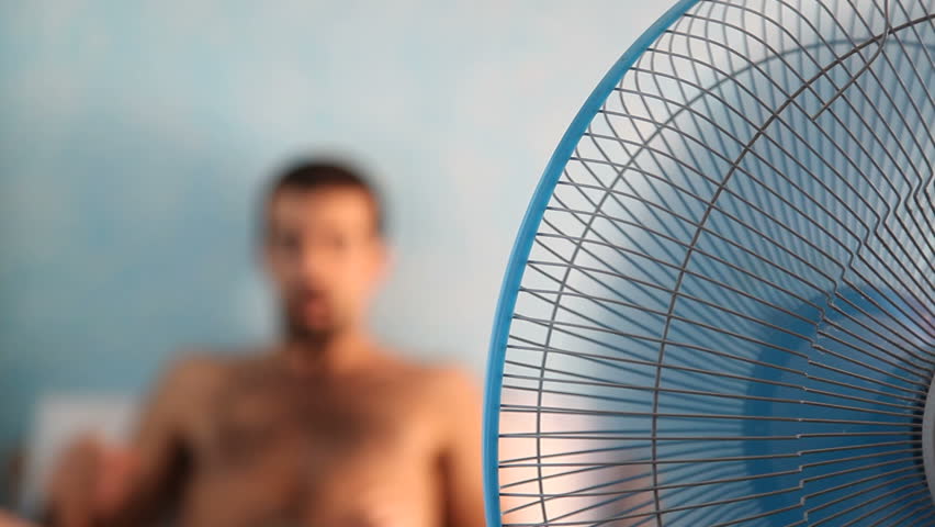 Young Man and Fan, Summer Stock Footage Video (100% Royalty-free ...