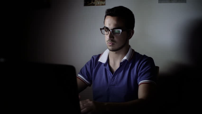 Hacker Typing At Laptop. Man Coding On Computer Dark Night. Man In Dark ...