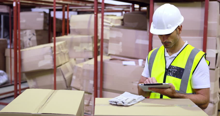 Warehouse Worker Checking Boxes for Stock Footage Video (100% Royalty-free) 6857995 | Shutterstock