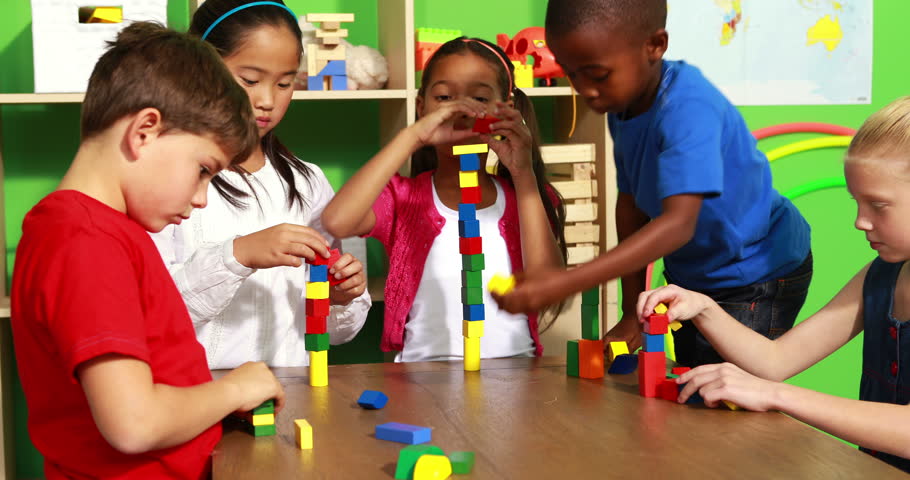Cute Classmates Playing With Building Blocks In Playschool Stock ...