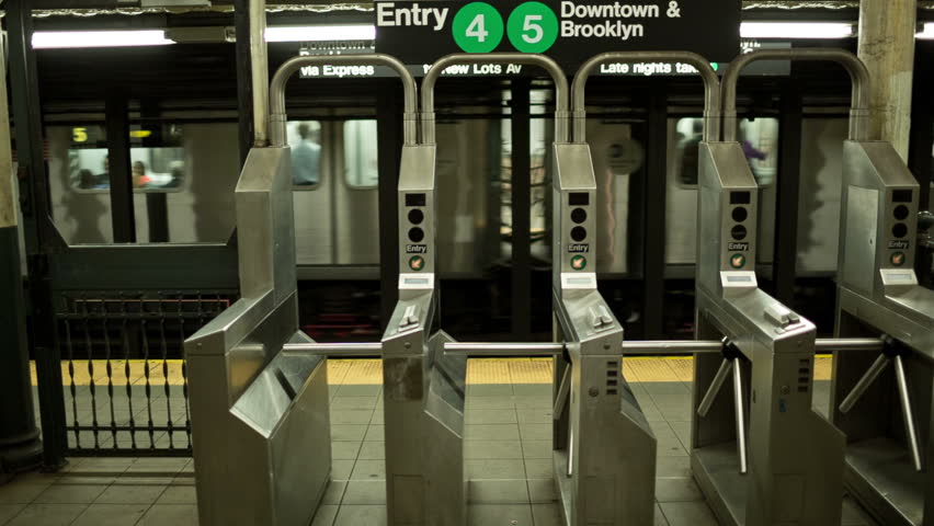 NEW YORK - JULY 17, 2014: MTA Subway Station Turnstiles In Manhattan ...