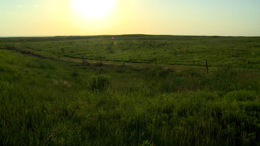 Grassy Plains Of Kansas At Sunset. Wide Open Windswept Landscape. Stock ...