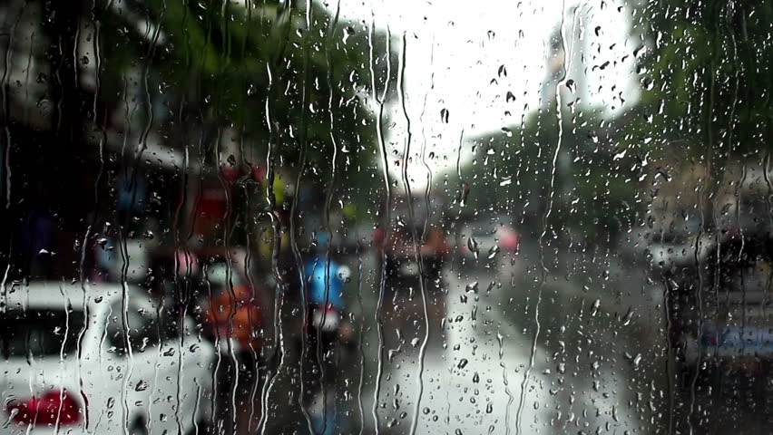 Stock video of raindrops moving across the windshield on | 7166245 ...