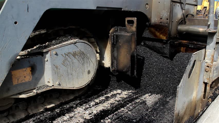 Close Up Asphalt. Asphalt Paver Machine During Road Construction ...