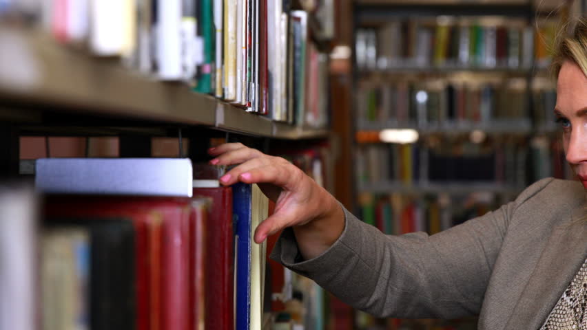 Portrait of Caucasian Librarian Taking Stock Footage Video (100% ...