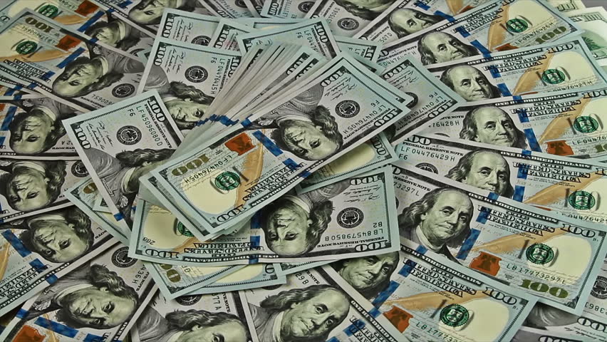 US Dollars Bundle Closeup Rotation On The Top Of Usd Banknotes Heap ...