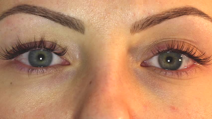 Young Woman Looks Up, Batting Eyelashes Stock Footage Video 1042024 ...