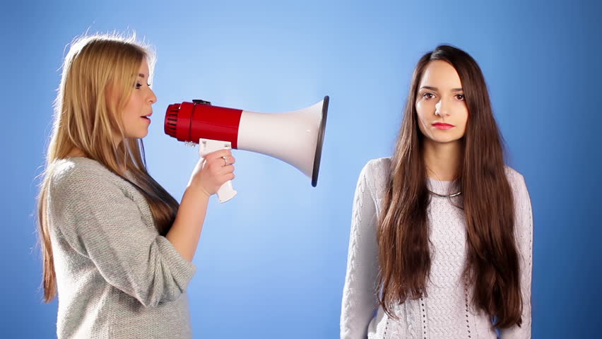 Stock video of girl scream in megaphone on ear | 8735605 | Shutterstock