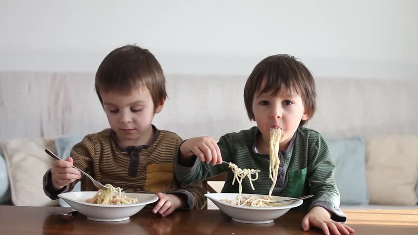 Adorable Little Kids, Eating Spaghetti At Home, Homemade Pasta Stock ...