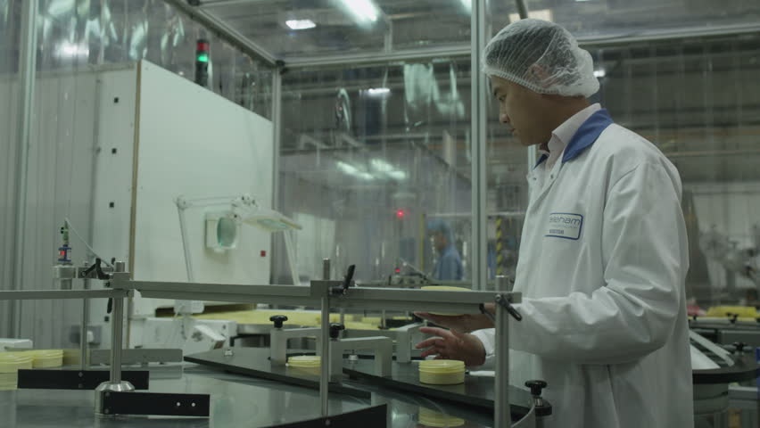 Operator CNC And Packaging Production/Worker Operates Industrial ...