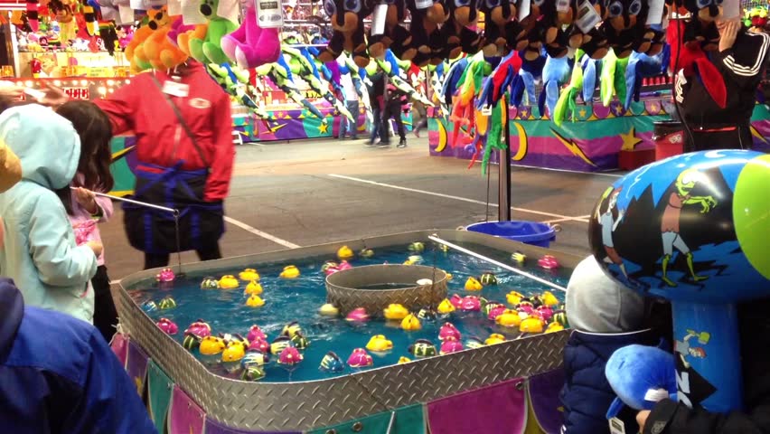 Trying To Win A Fish At Carnival Stock Footage Video 6260774 | Shutterstock