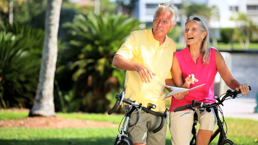 Active Senior Couple Enjoying Retirement Leisure Out Cycling Stock ...